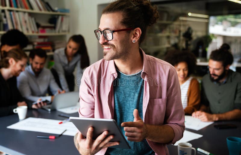 Success Business Man with Tablet, Analytics and Developer for Startup ... Success Business Man with Tablet, Analytics and Developer for Startup ...