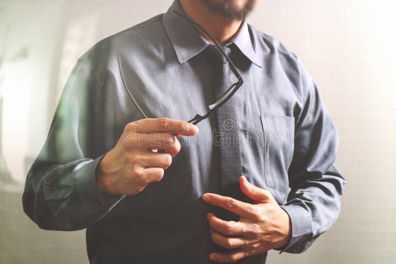 Success Businessman Holding His Eyeglass ,front View,filter Effect ...