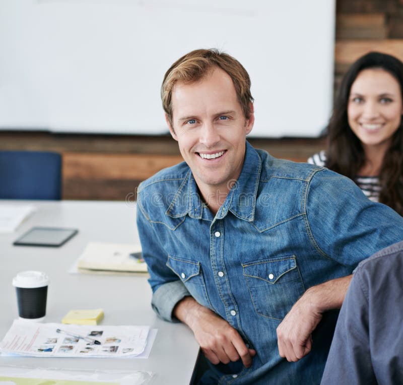 Success Comes in a Can Not a Cant. Portrait of a Young Designer Sitting ...