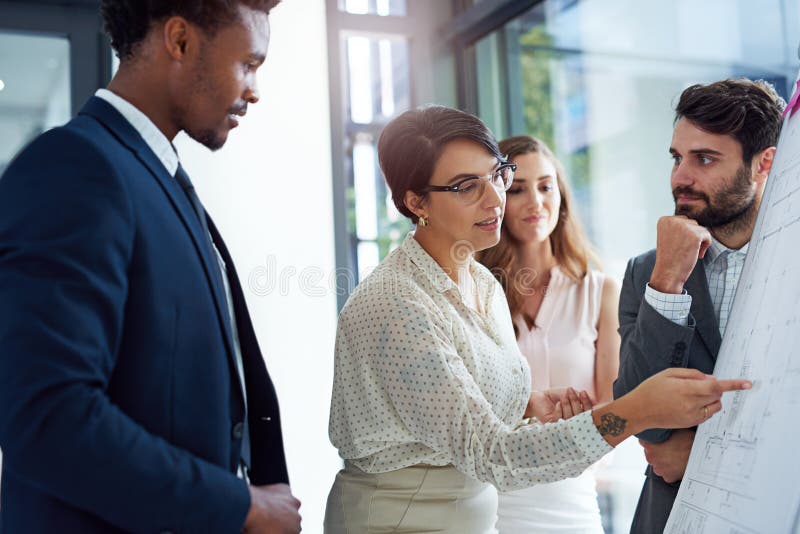 Success Demands Effective Collaboration. a Team of Professionals Having ...