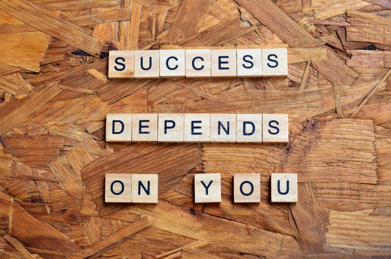 Success Depends on You Text on Wooden Square, Motivation Quotes Stock ...