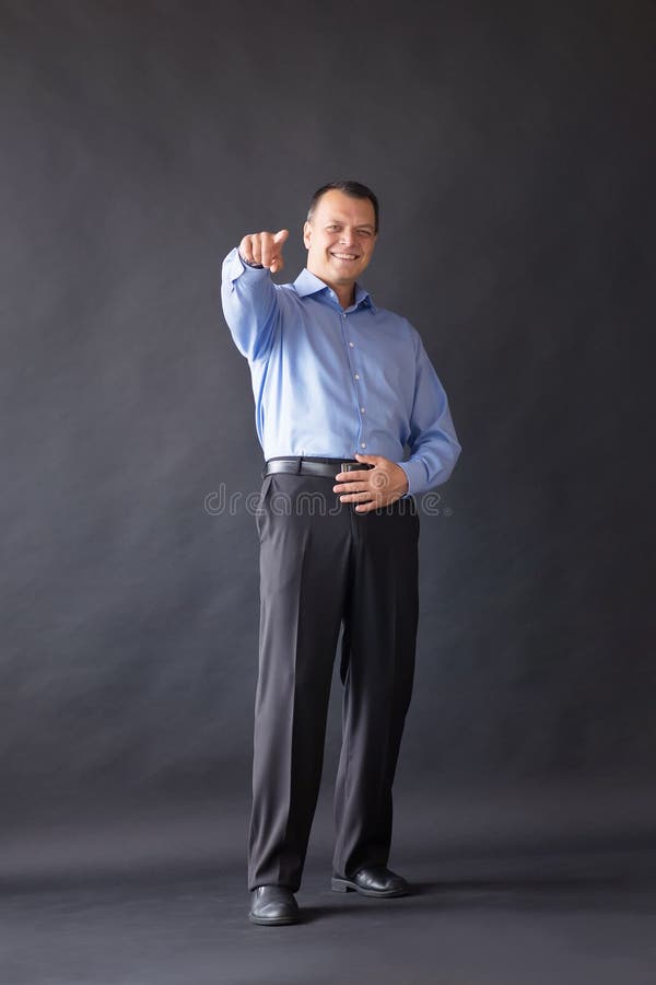 Success Handsome Man Standing in Studio. Finger Stock Photo - Image of ...