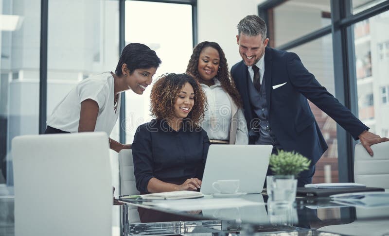 Success - Hard Work and Teamwork Got Them There. a Group of Colleagues ...