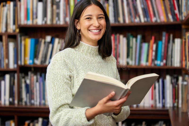 Success Has Already Been Written. a Young Woman Reading a Book in a ...