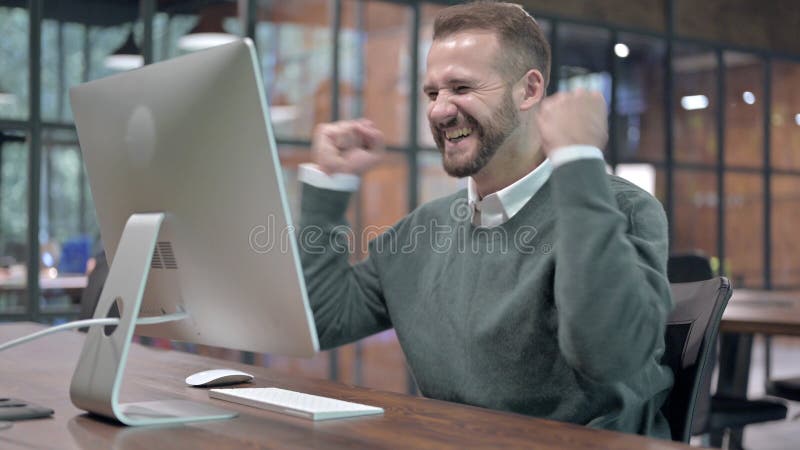 Success Man Celebrating while Working on Computer Stock Photo - Image ...