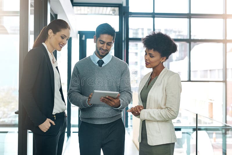 Success is a Sure Thing with Teamwork and Technology. a Diverse Group ...