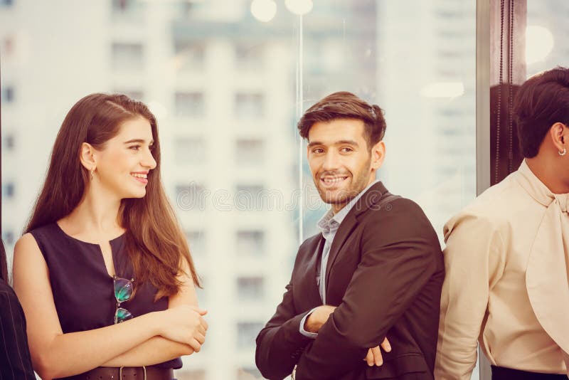 Success and Teamwork Concept, Group of Young Business People Chatting ...