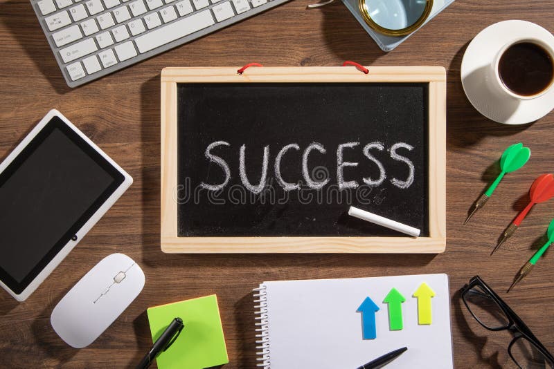 Success Text on Blackboard with a Coffee and Other Objects Stock Image ...
