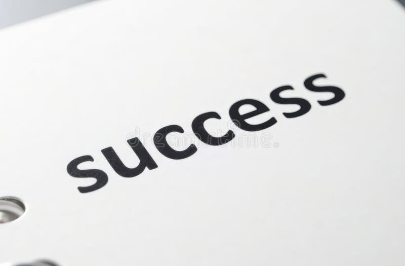 Success Written in Bold Letters on a Blank Notebook Page Reflects ...