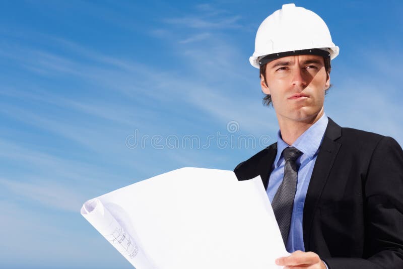 Successful Architect Holding a Blueprint Against Clear Sky. Portrait of ...