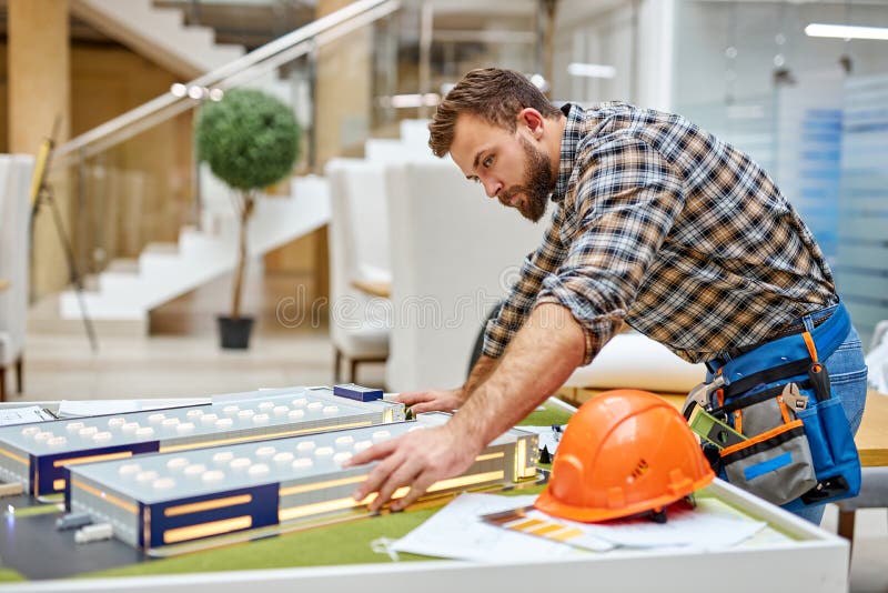 Successful Architect Plans, Calculates Distance, Scale of the Building ...