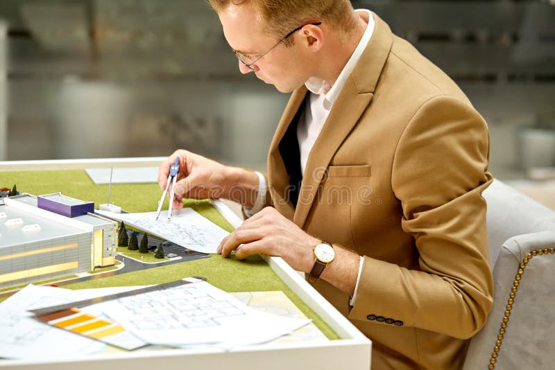 Successful Architect Plans, Calculates Distance, Scale of the Building ...