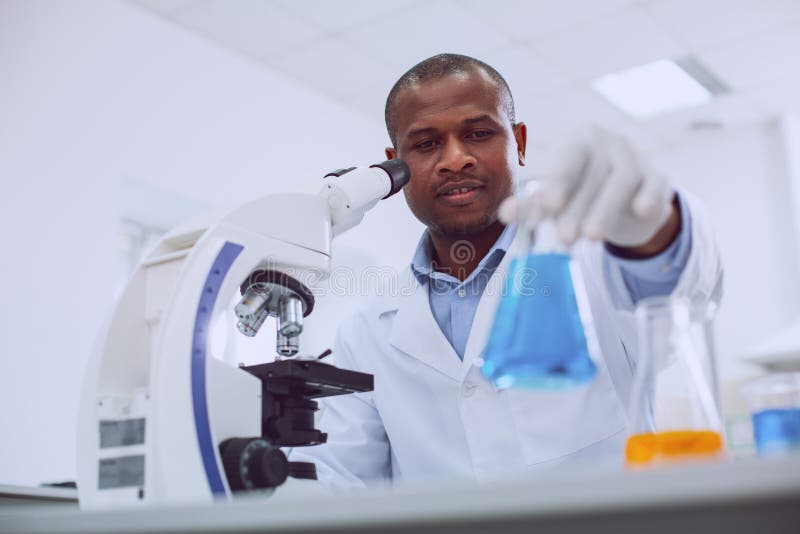 Successful Biologist Working with His Microscope Stock Photo - Image of ...