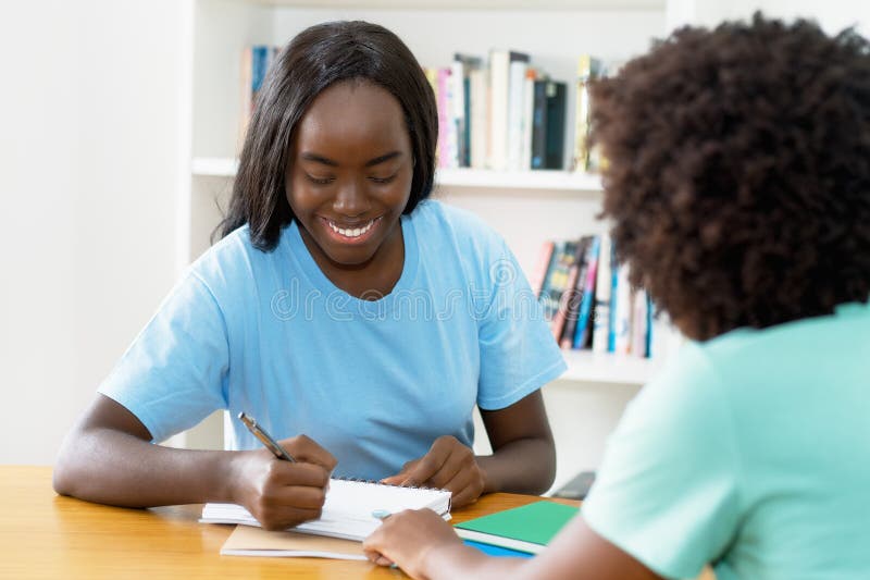 Successful Black Female Student Preparing for Exam on Private Lessons ...