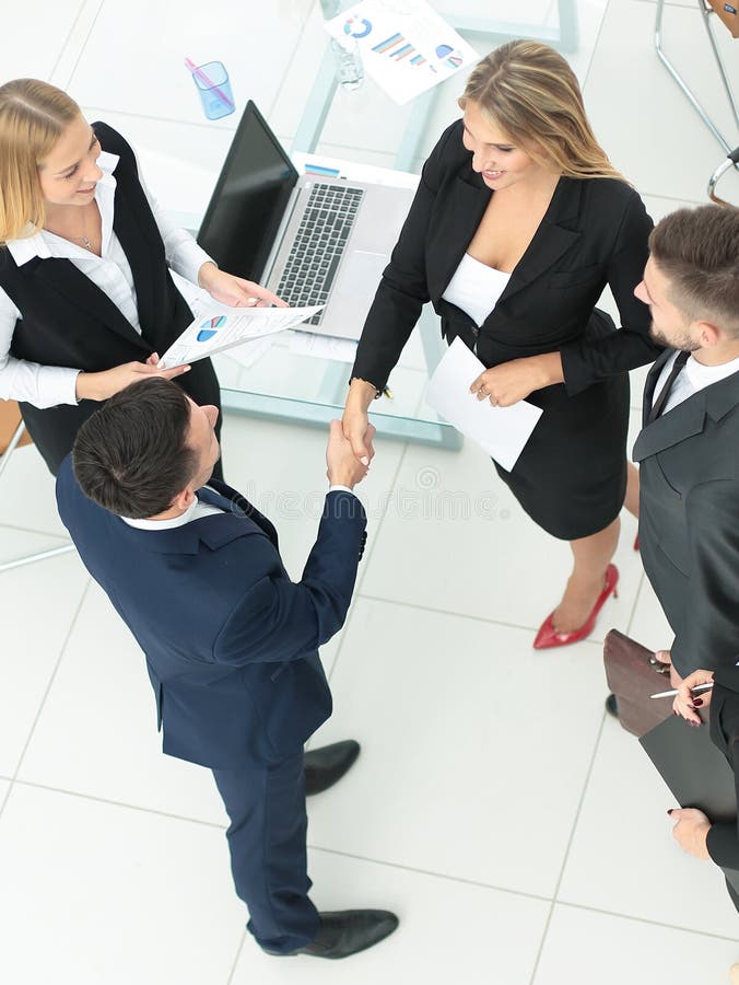 Successful Busines Team Making Handshake in an Modern Office Stock ...