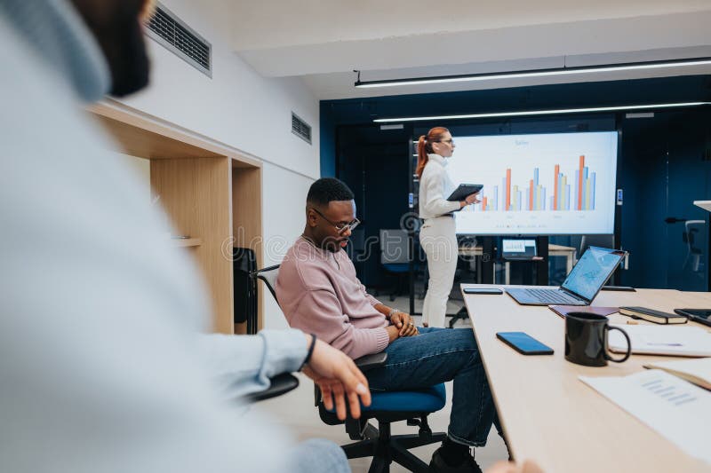 Business Team Collaborating and Analyzing Stats for Strategic Planning ...