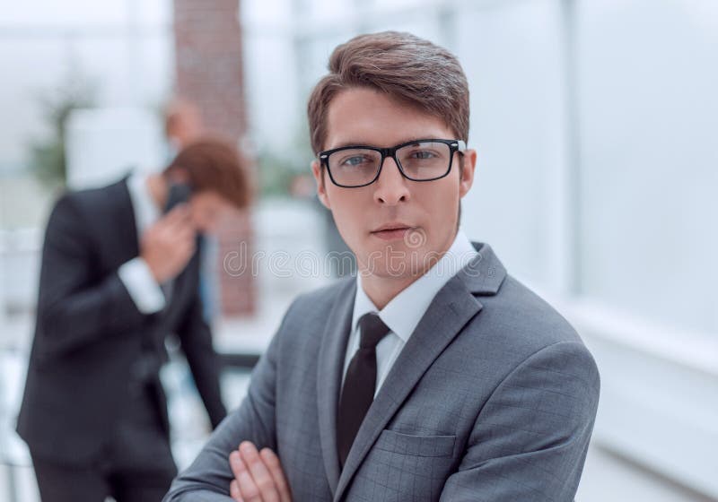 Successful Business Man Standing in a Modern Office. Stock Photo ...