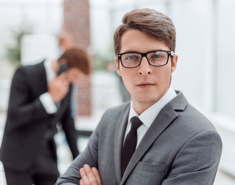 Successful Business Man Standing in a Modern Office. Stock Image ...