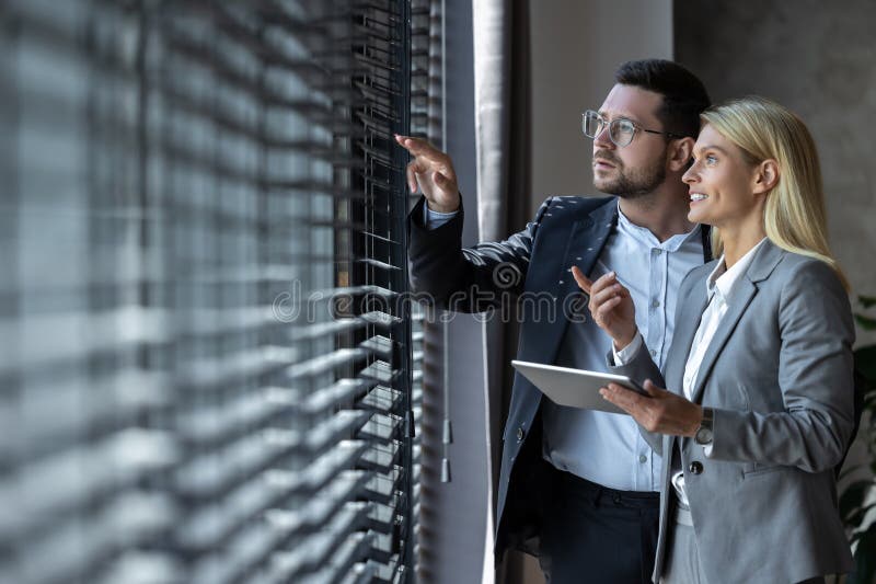 Business People Enjoying Work Together Using Tablet for Online Project ...