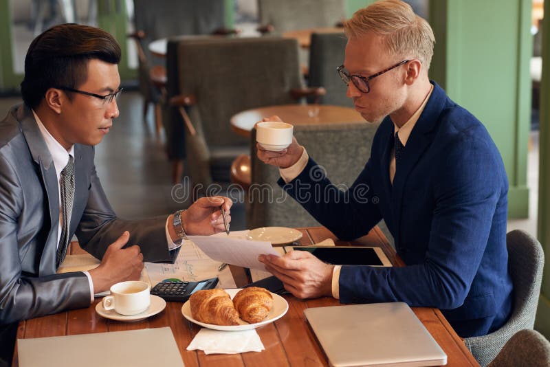 Coffee and papers stock image. Image of colleague, analyzing - 99863389