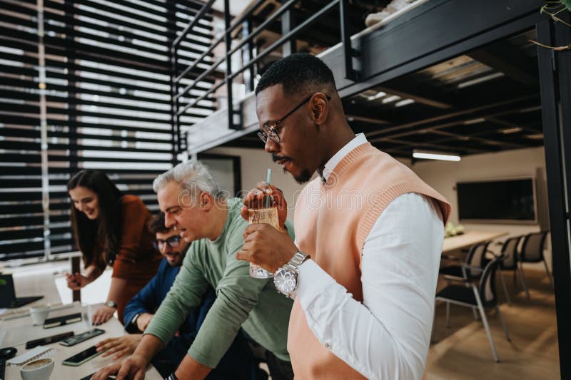 Successful Business Team Collaborating on Project in Corporate Office ... Successful Business Team Collaborating on Project in Corporate Office ...
