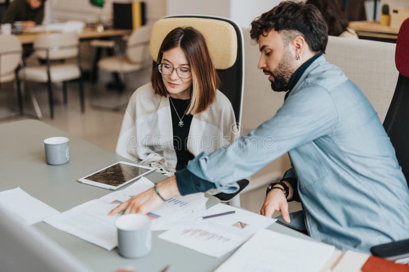 Successful Business Team Collaborating on Project Solutions in Modern ...