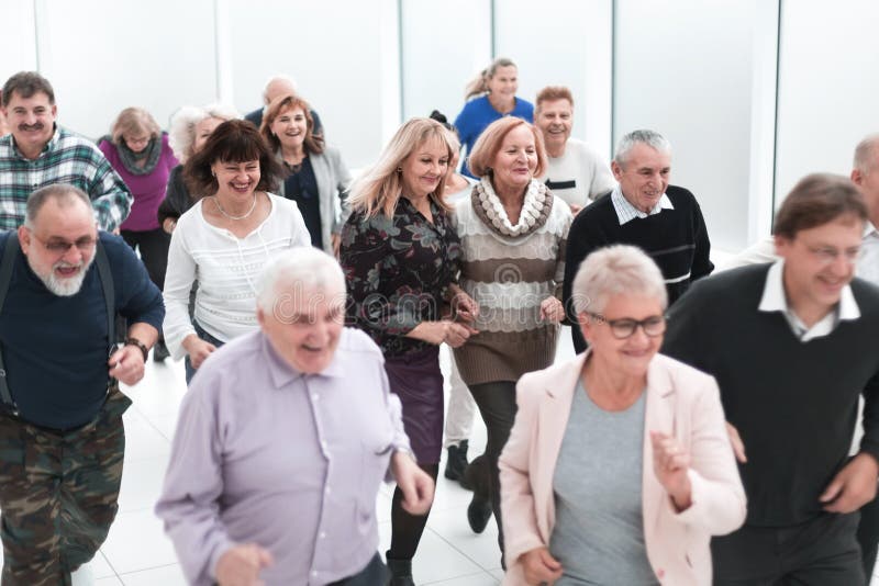 Successful Business Team Running in the Office Hall Stock Photo - Image ...