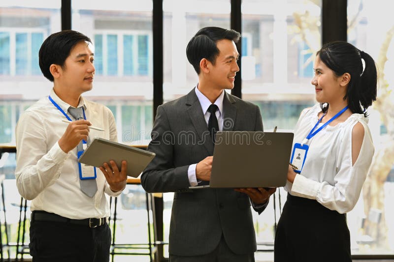 Successful Business Team Sharing Ideas, Discussing Business Strategy ...