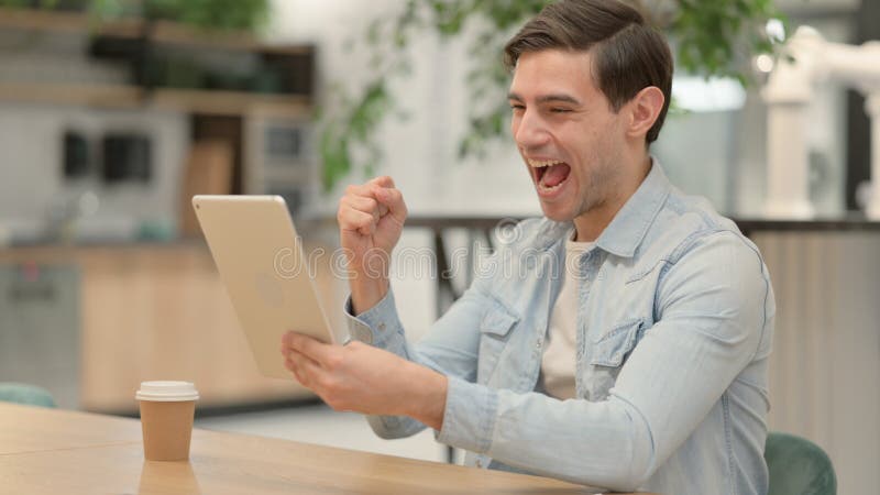 Successful Man Celebrating on Tablet at Work Stock Image - Image of ...
