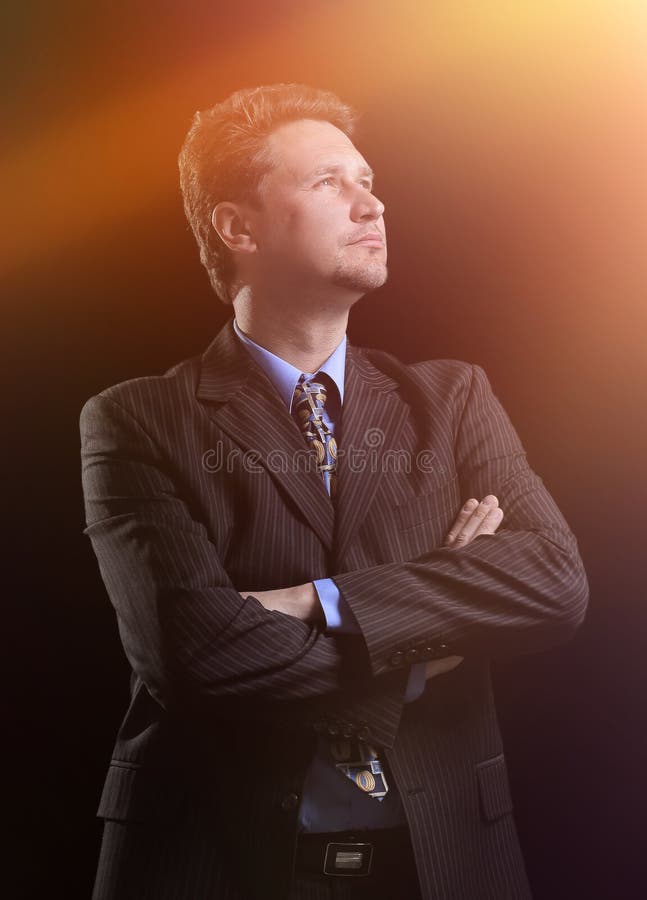 Successful Businessman on a Dark Background. Stock Image - Image of ... Successful Businessman on a Dark Background. Stock Image - Image of ...