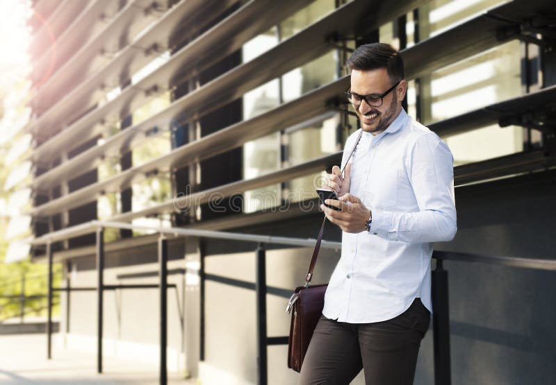 Successful Businessman with Mobile Phone Stock Photo - Image of office ...