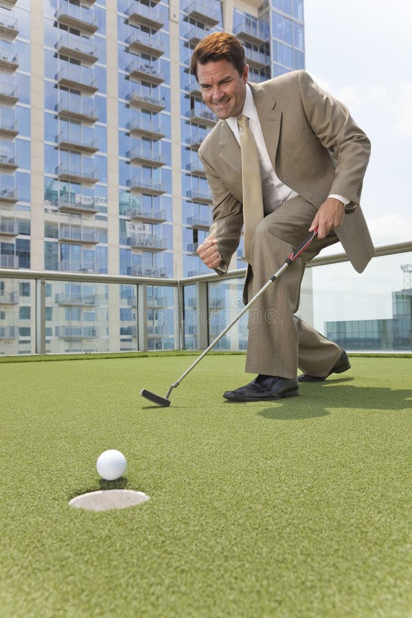 Successful Businessman Playing Rooftop Golf Stock Image - Image of ...