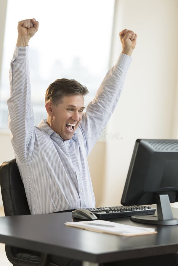 Successful Businessman Screaming while Using Computer Stock Image ...