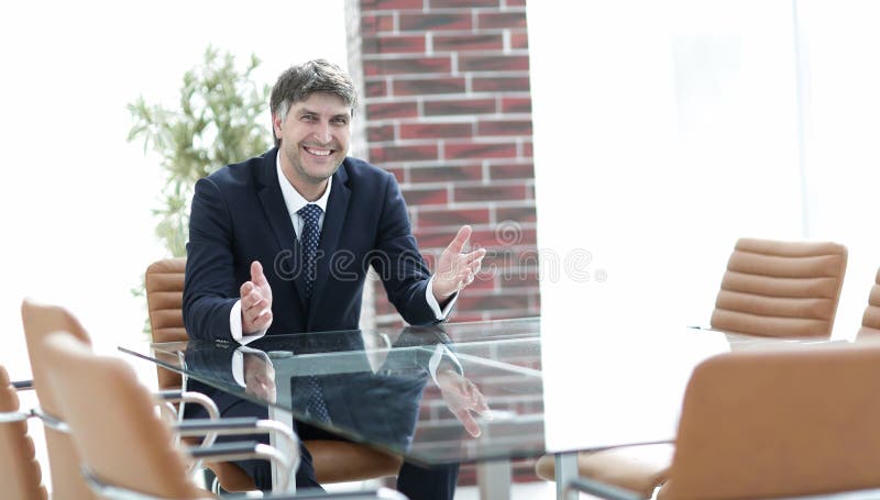 Successful Businessman Sitting in an Empty Desk Stock Photo - Image of ...