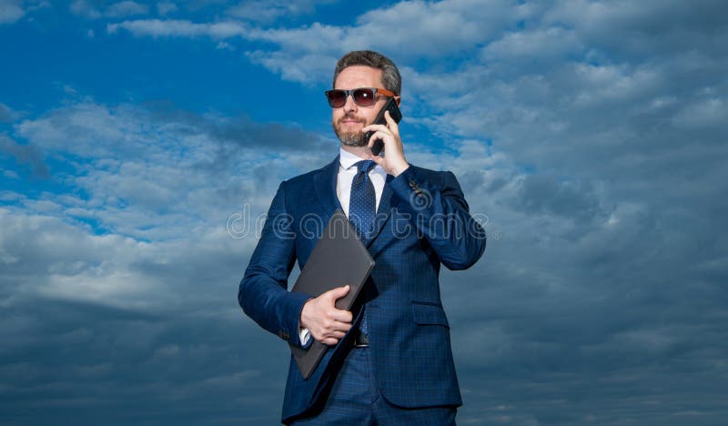 Successful Businessman Talking on Mobile Phone. Professional Man Having ... Successful Businessman Talking on Mobile Phone. Professional Man Having ...