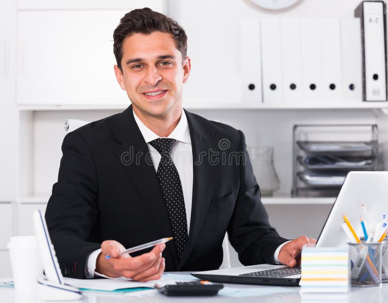 Successful Businessman Using Laptop Stock Image - Image of looking ...