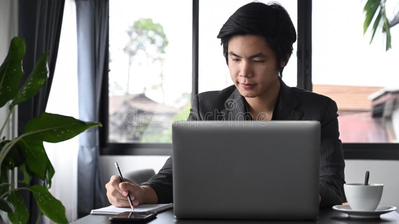 Businessman Working with Computer Laptop in Office. Stock Photo - Image ...
