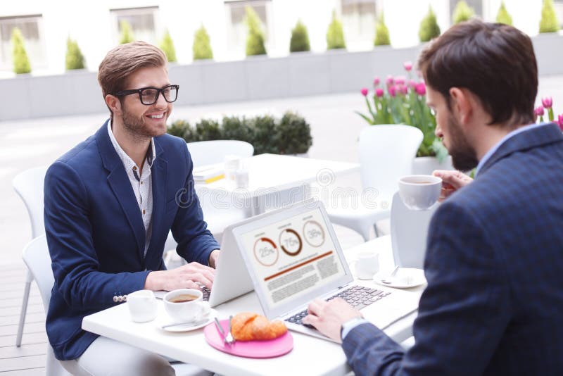 Successful Businessmen are Using Computers in Restaurant Stock Image ...