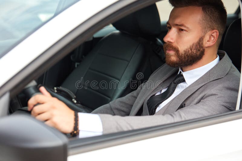 Successful Caucasian Man in Formal Suit Driving a Car Stock Image ...