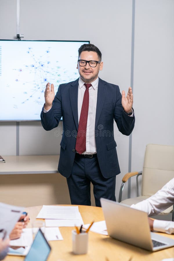 Successful Coach in Formalwear Explaining Points of Business Course ...