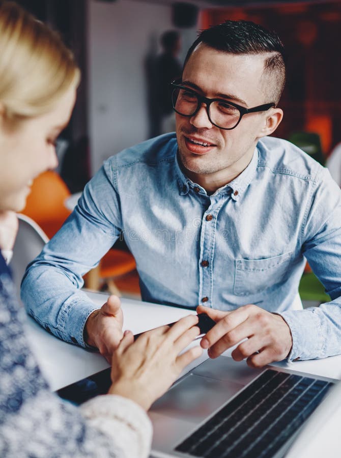 Successful Colleagues Communicating with Each Other about App on ...