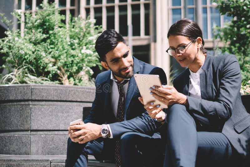 Successful Colleagues Watching Video Online Via Digital Tablet Stock ...