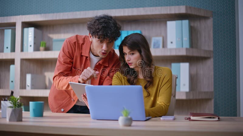 Successful Coworkers Collaborating Project Using Laptop and Tablet ...