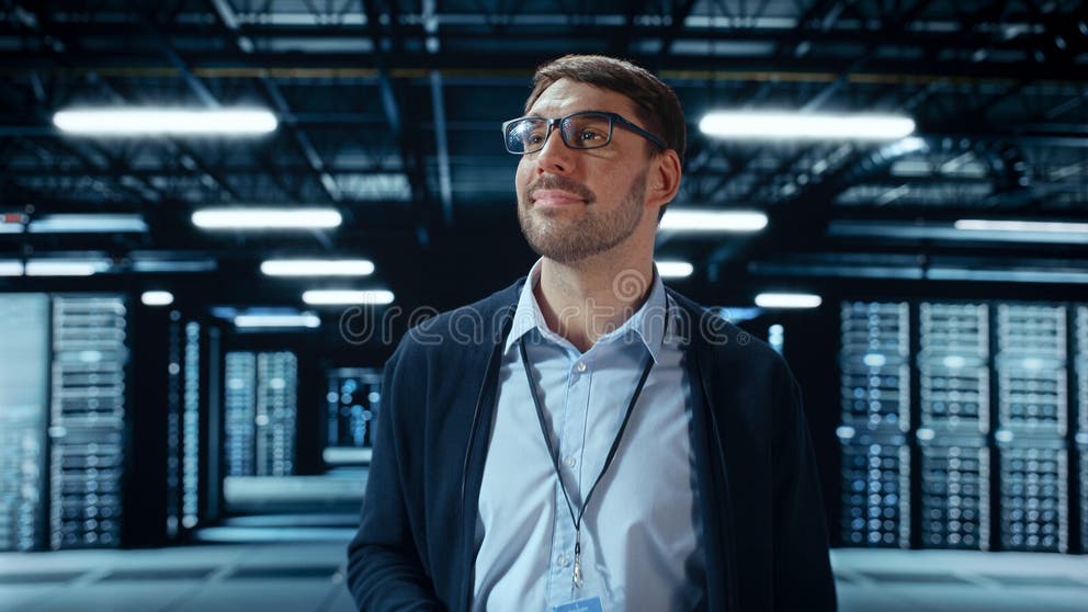 Successful Data Center it Specialist Using Tablet Computer. Server Farm Cloud Computing Facility ...