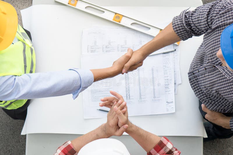 Successful Deal, Engineer / Contractor Shaking Hands with Client in ...