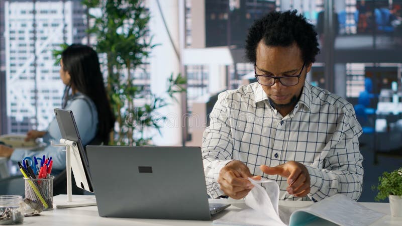 Successful Entrepreneur Working on Financial Forecasts at His Desk ...