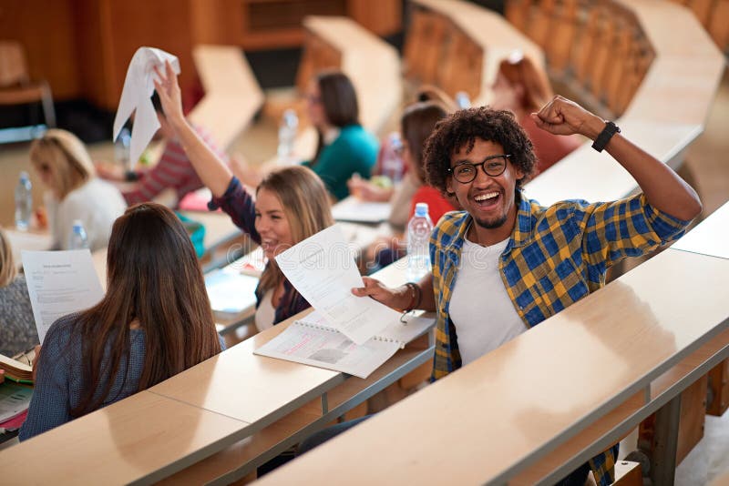Successful Final Examination - Students Having a Test in a Classroom ...