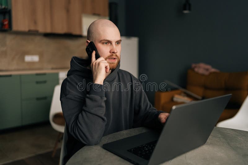 Successful Freelancer in Hoodie Working from Home Office, Sitting at ...