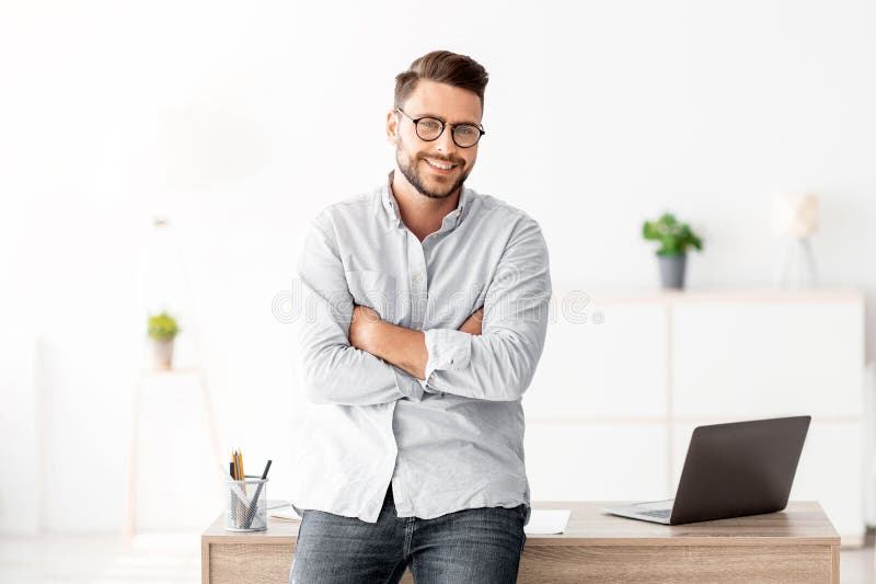 Successful Freelancer Man Standing at Desk at Home Office Interior ...
