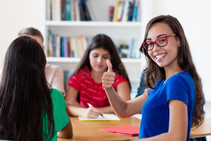 Successful French Female Student Learning with Group of Students Stock ...